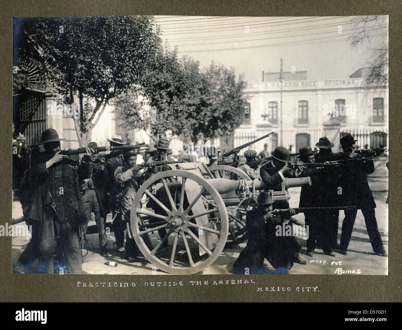 Mexican Revolutionary soldiers practicing artillery outside the arsenal ...