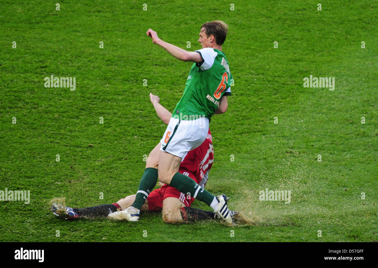 Bremen's Tim Borowski (top) and Munich's Mark van Bommel vie for the ...