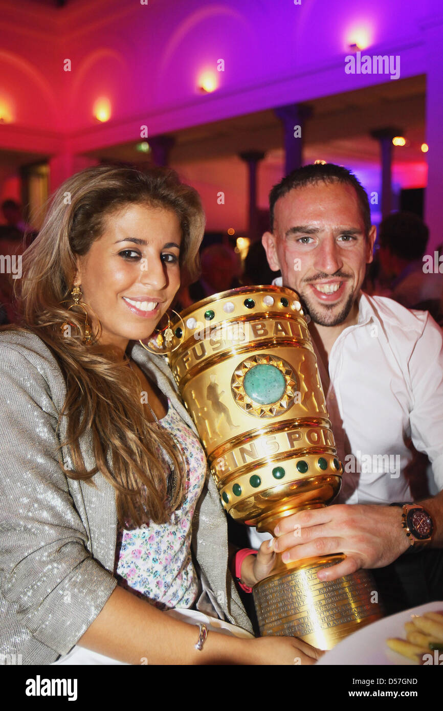 Bayern Munich's Franck Ribery ahd his wife Wahiba smile with the DFB ...