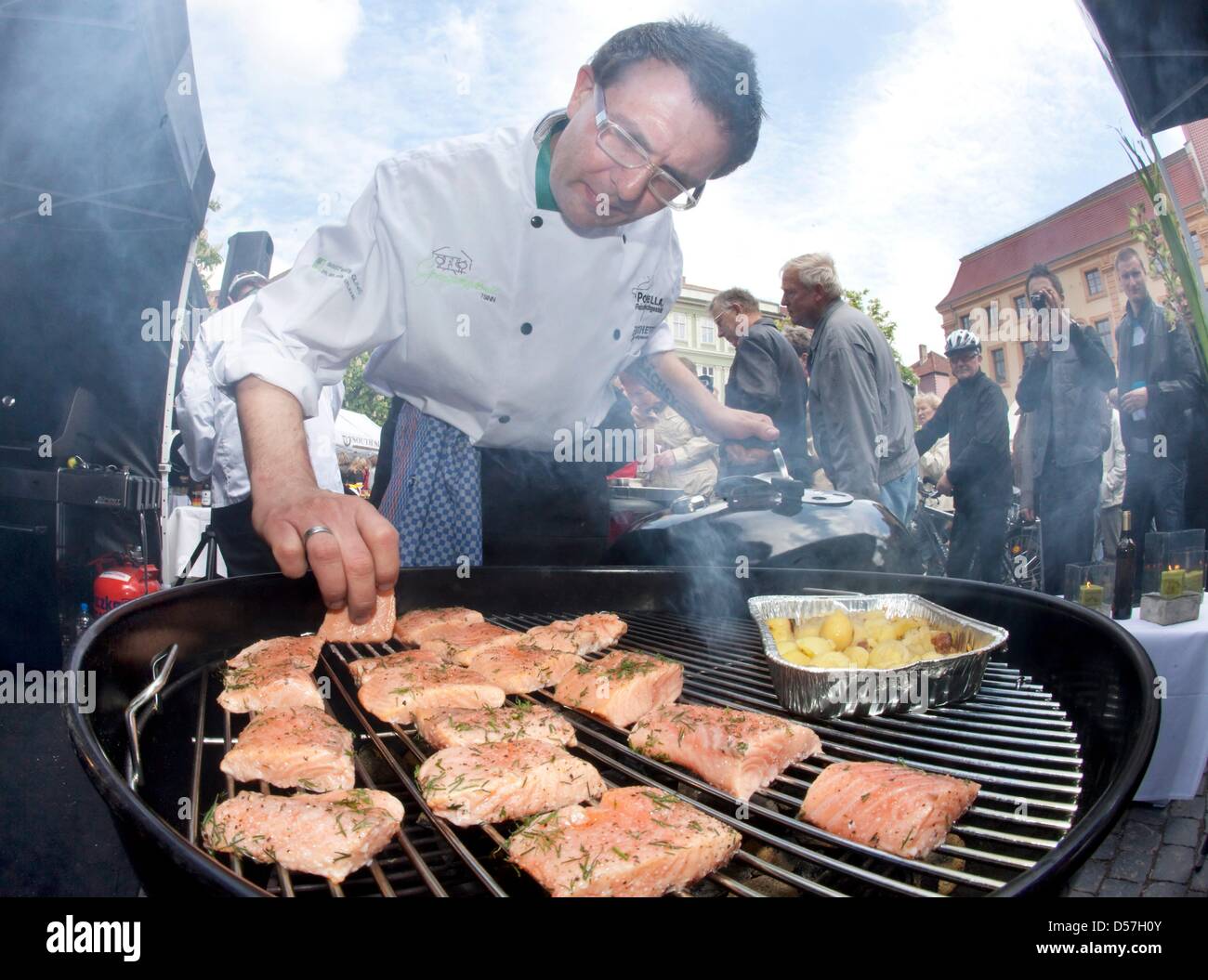 A chef of Team Sächsi prepares a dish at the 15th German Barbeque Cup ...