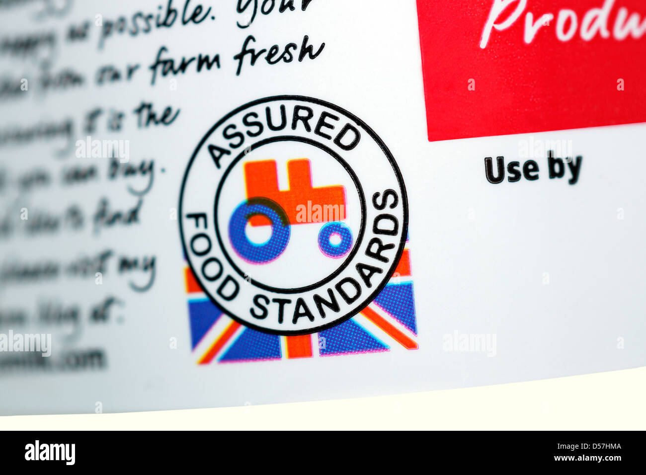 Skimmed milk sourced from farms of high standards with signs / logos of ...