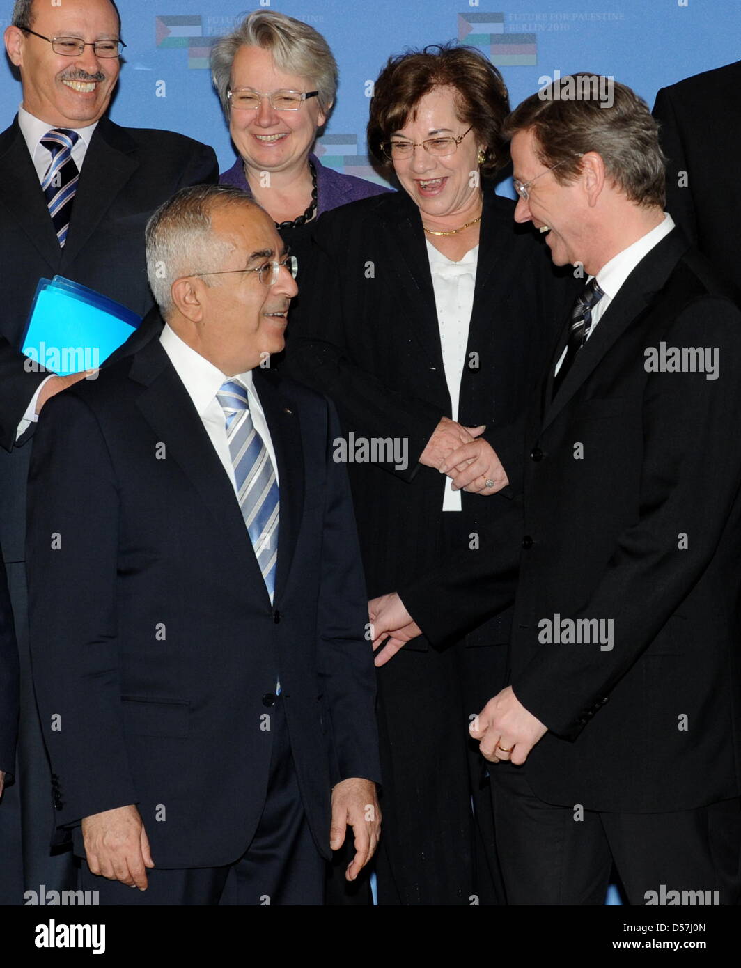 German Foreign Minister Guido Westerwelle (R) jokes around with the ...
