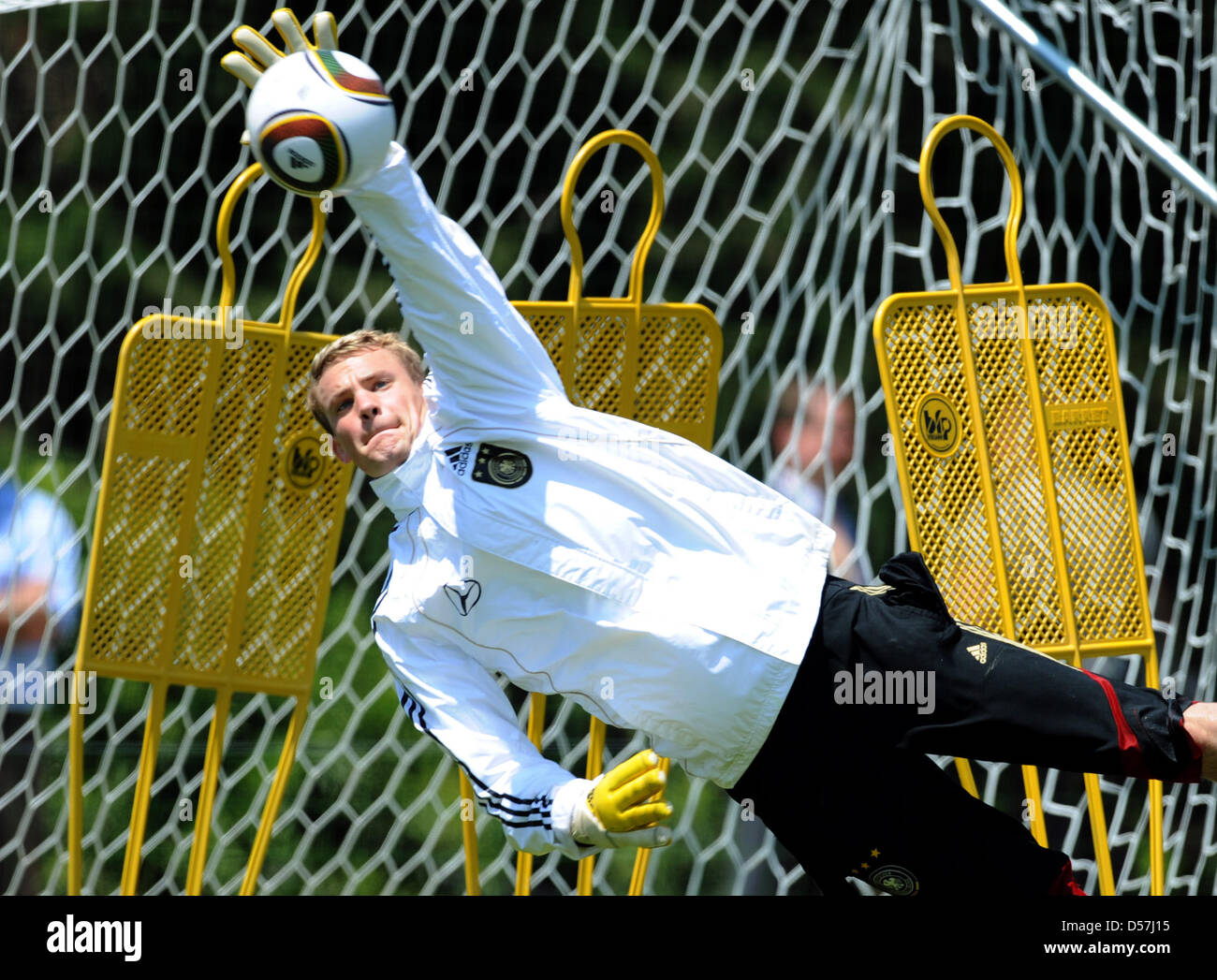 Germany's goalkeeper Manuel Neuer stops a ball during a training ...