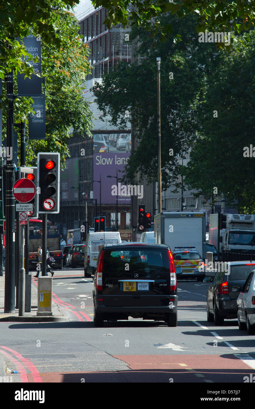 Red london taxi hi-res stock photography and images - Alamy