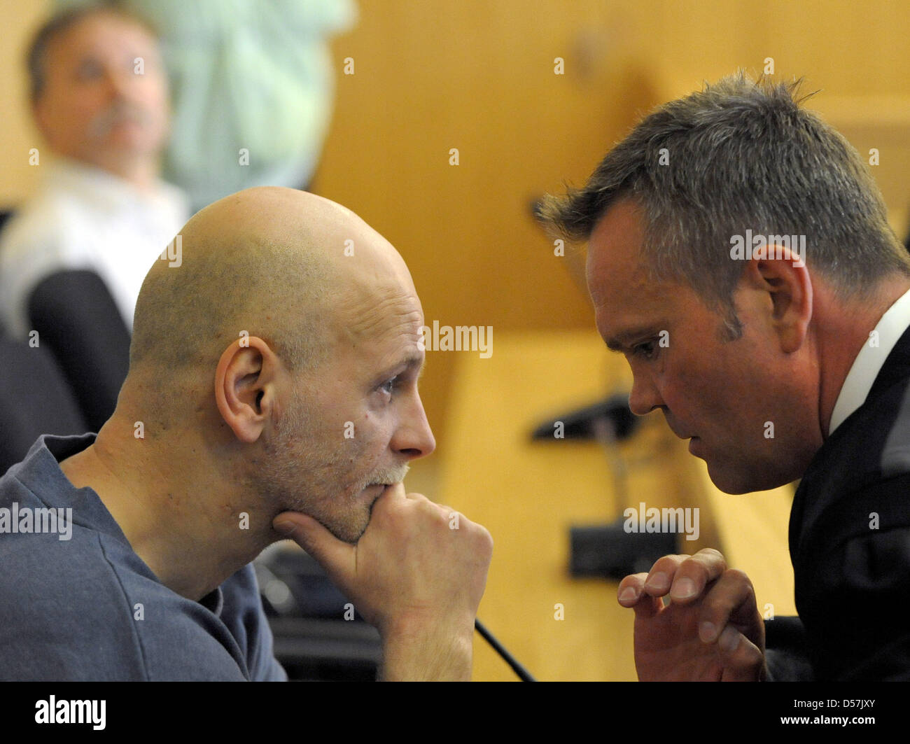 Defendant Peter Paul Michalski talks to his lawyer Andreas Chlosta (R ...