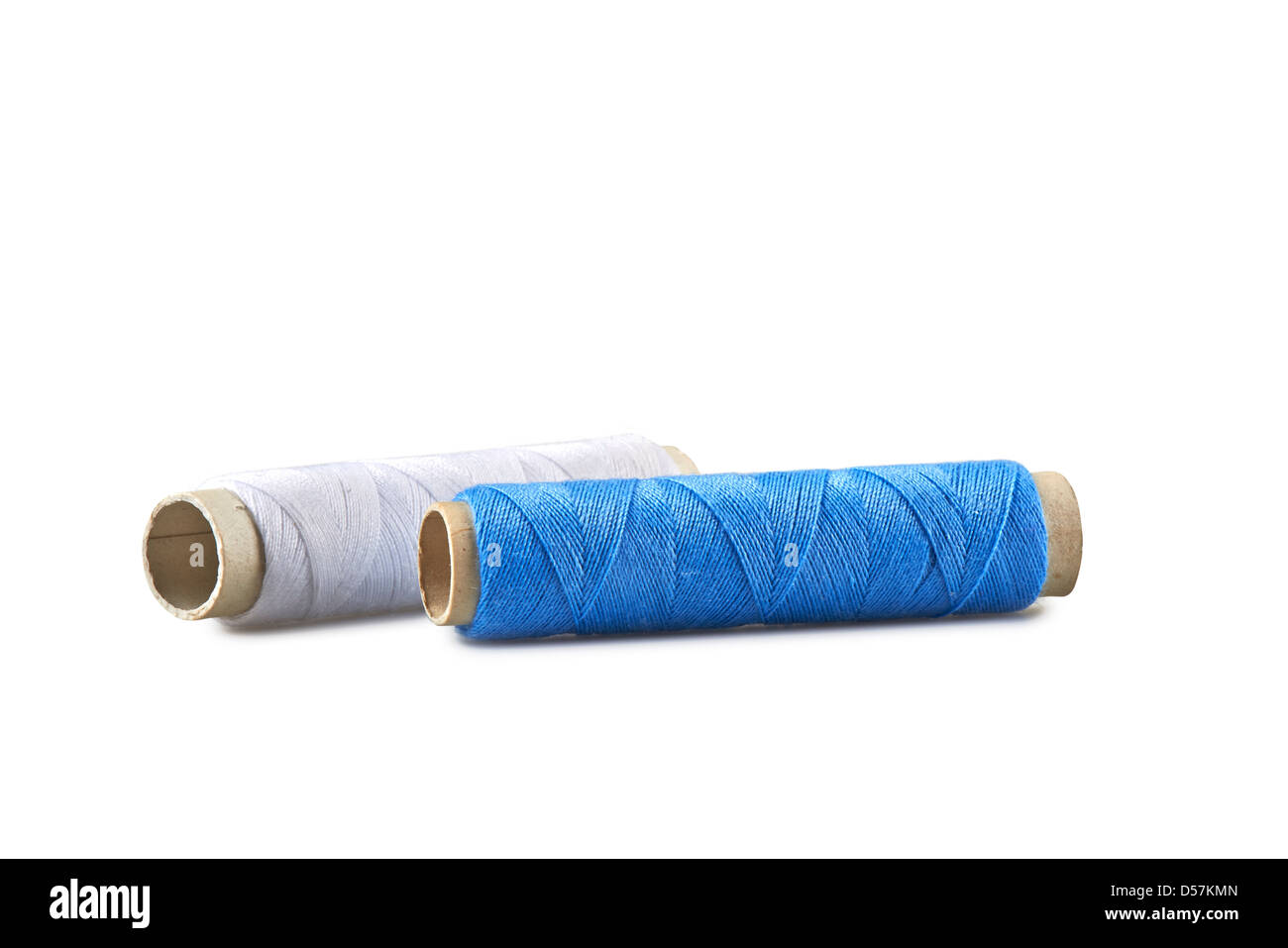 Sewing threads on white Stock Photo - Alamy