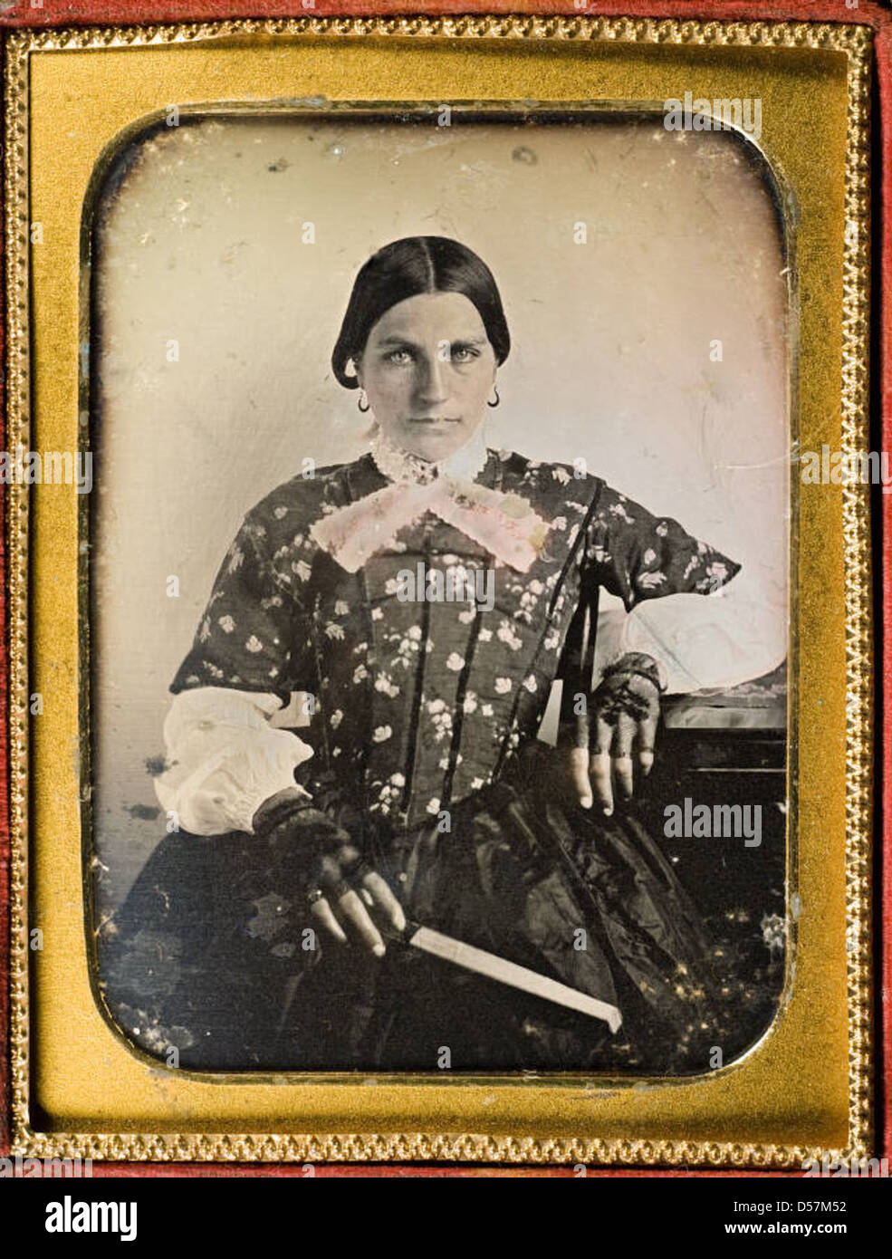 This daguerreotype features a seated woman, Miranda Sneed, from Texas ...