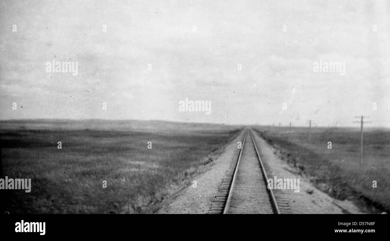 This photograph from 1907 shows railroad tracks cutting through the ...