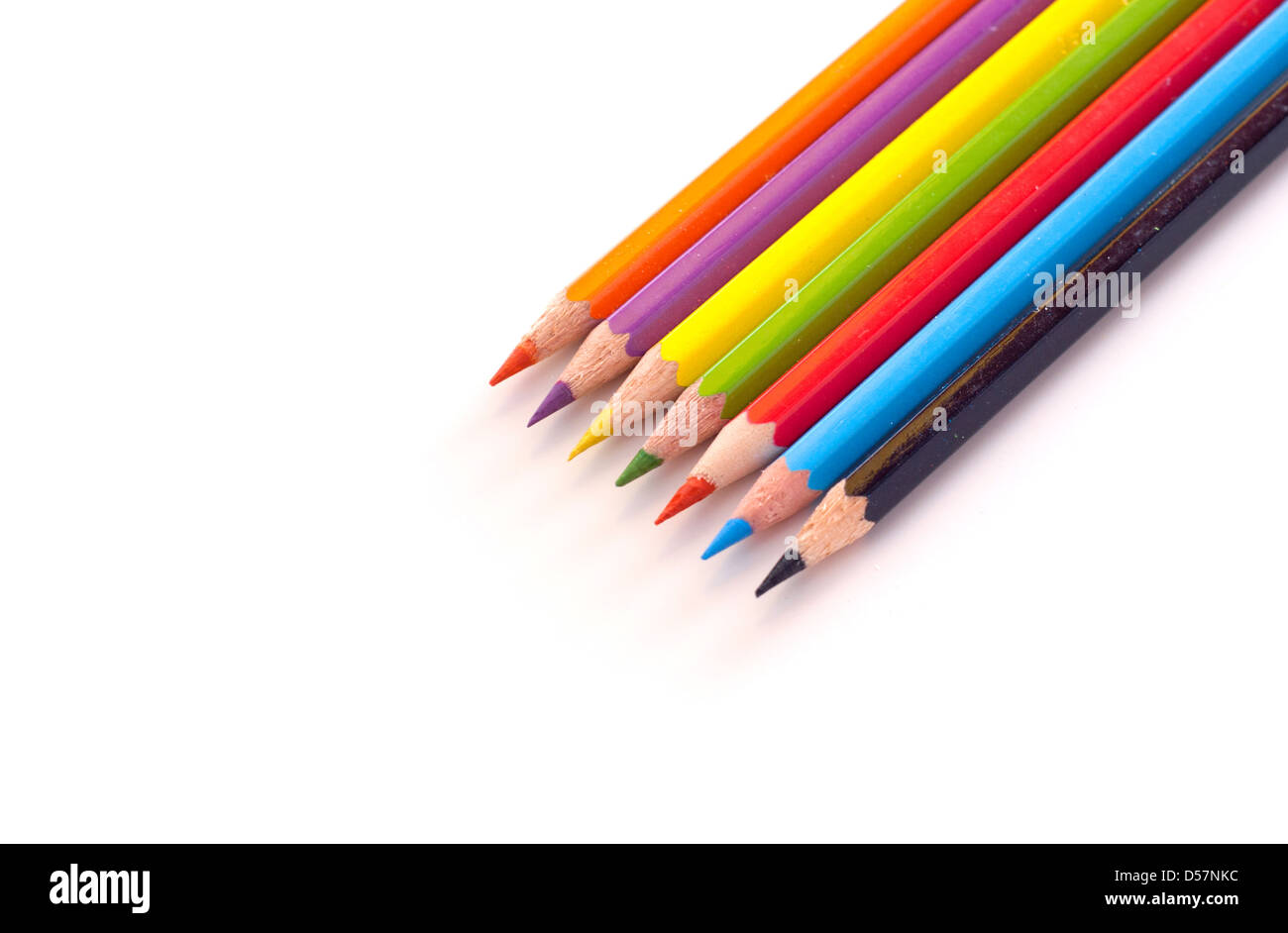 Colorful rainbow of pencil crayons or back to school image Stock Photo ...