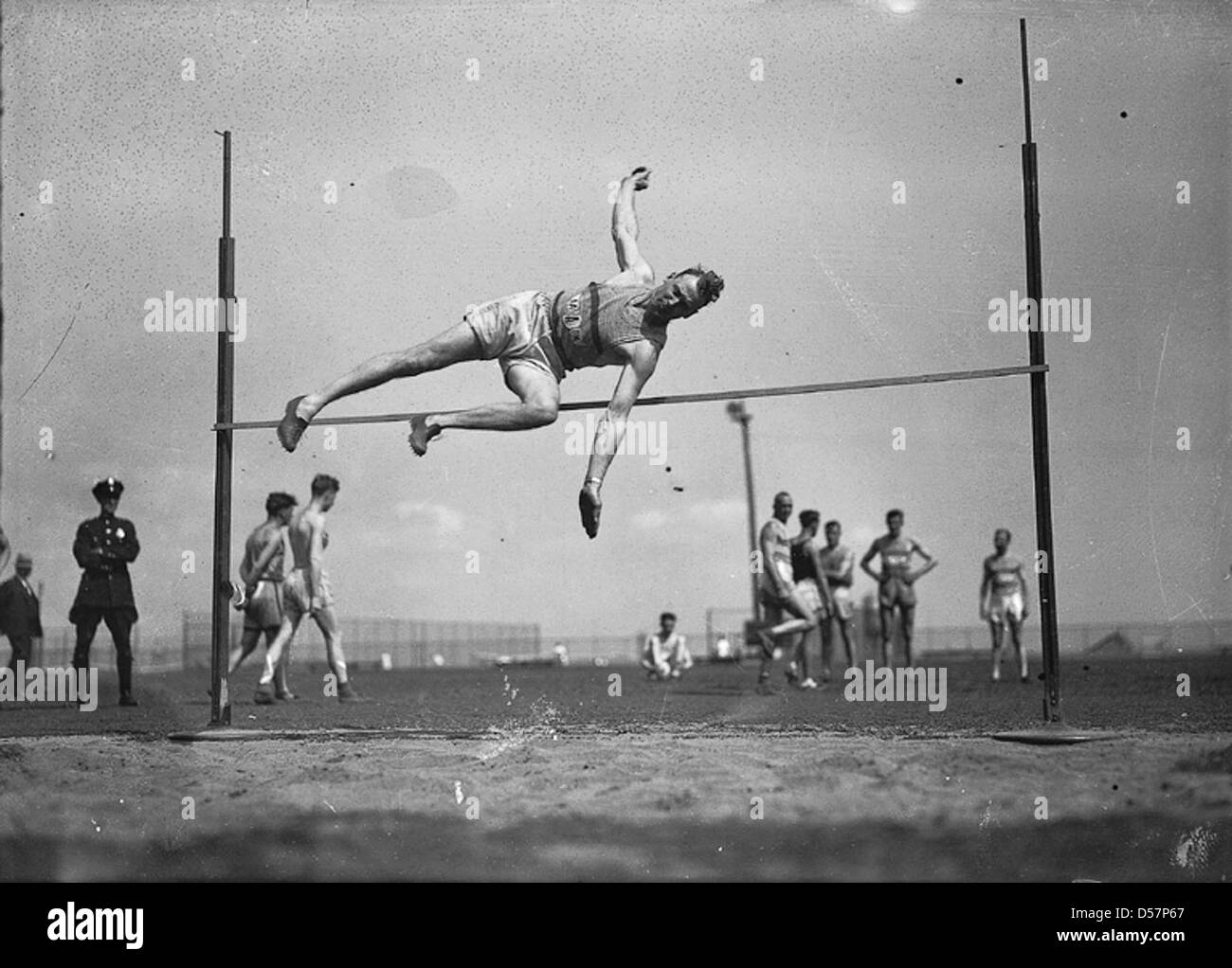 A photograph of a high jumper from the A. A. A. P. M. team in action ...