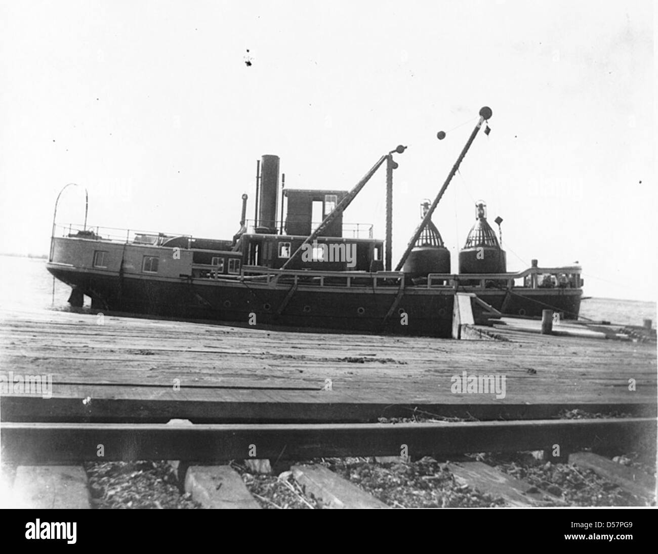 The tugboat 'Scout' is seen in Lachine, Quebec, in 1902, assisting in ...
