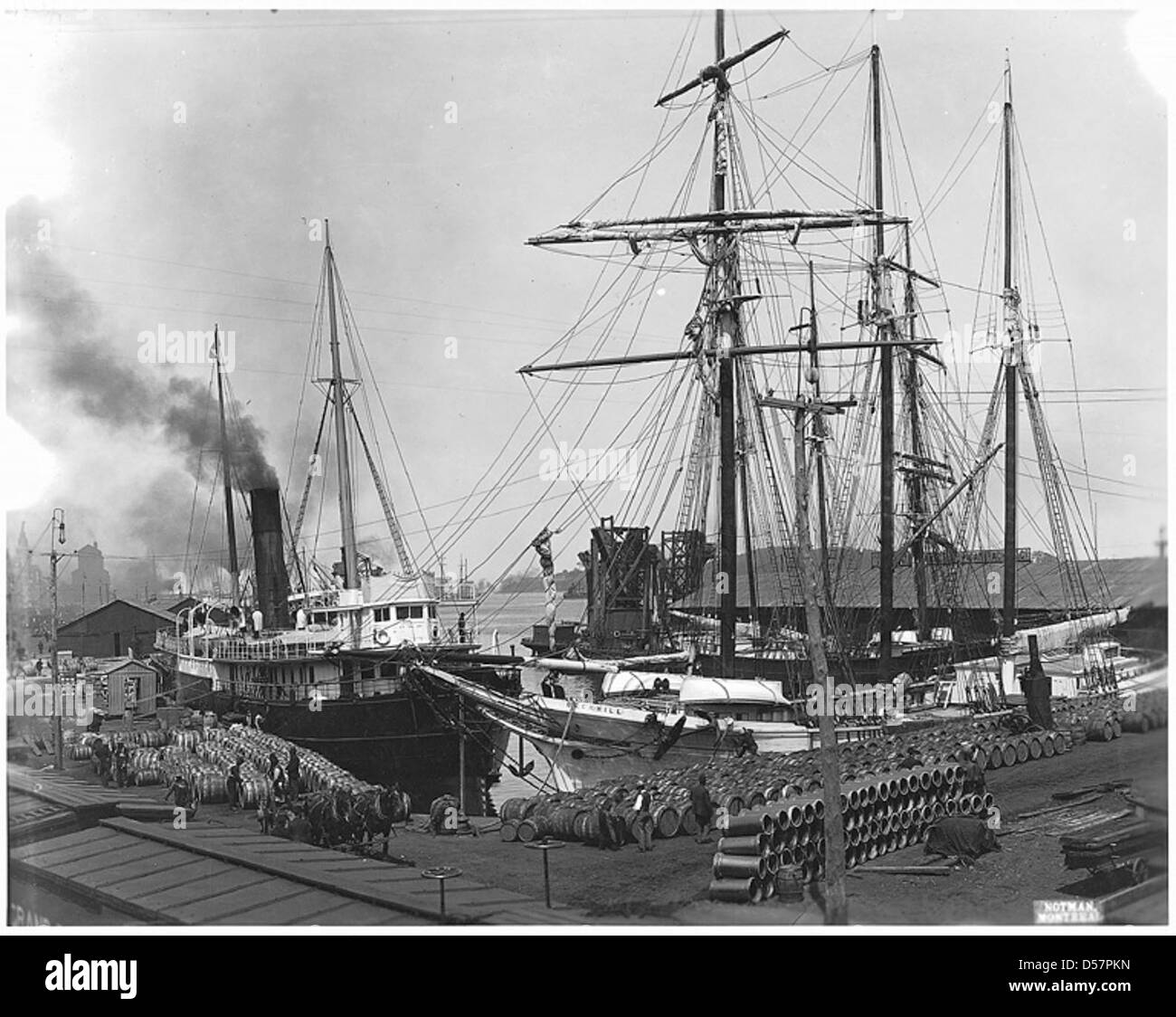 A photograph of the harbor in Montreal, Quebec, taken around 1900. The ...