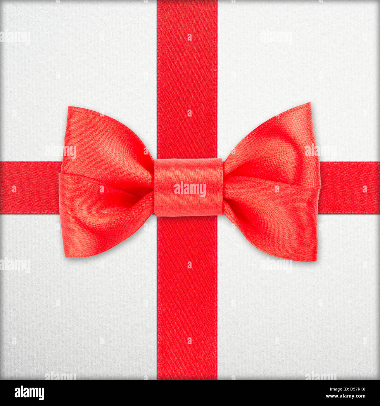 red bow and ribbon over wrapped gift Stock Photo - Alamy