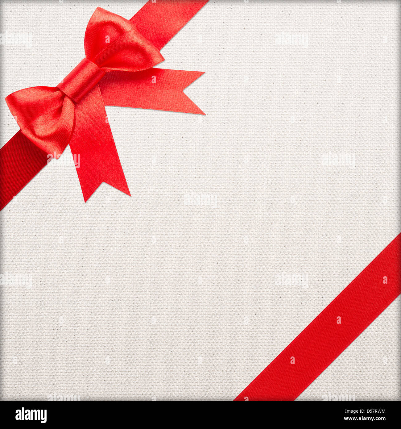 red bow and ribbon over wrapped gift Stock Photo - Alamy