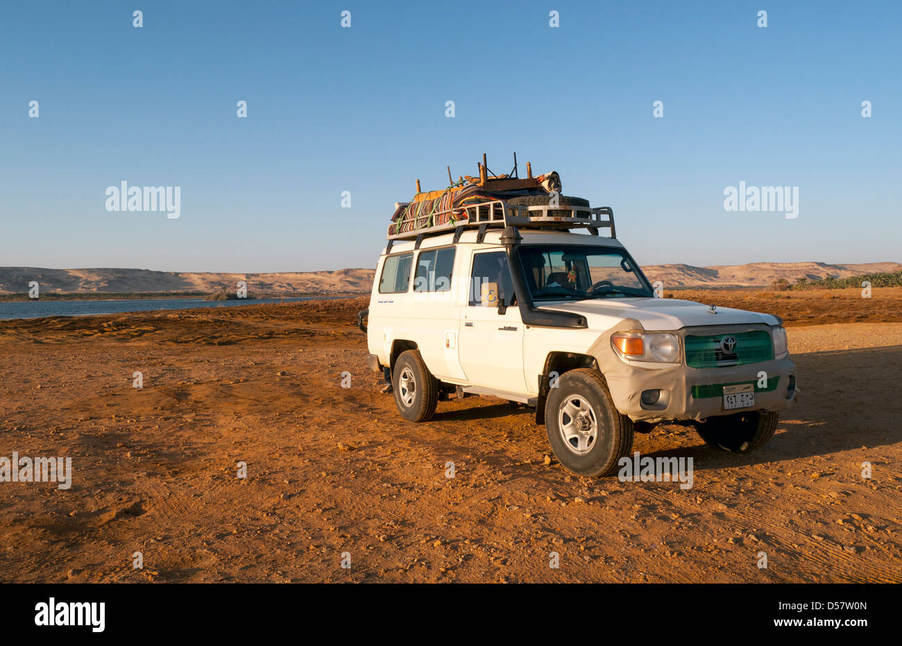 4WD by Al Marun Lake near Bahariya Oasis, Western Desert, Egypt Stock ...