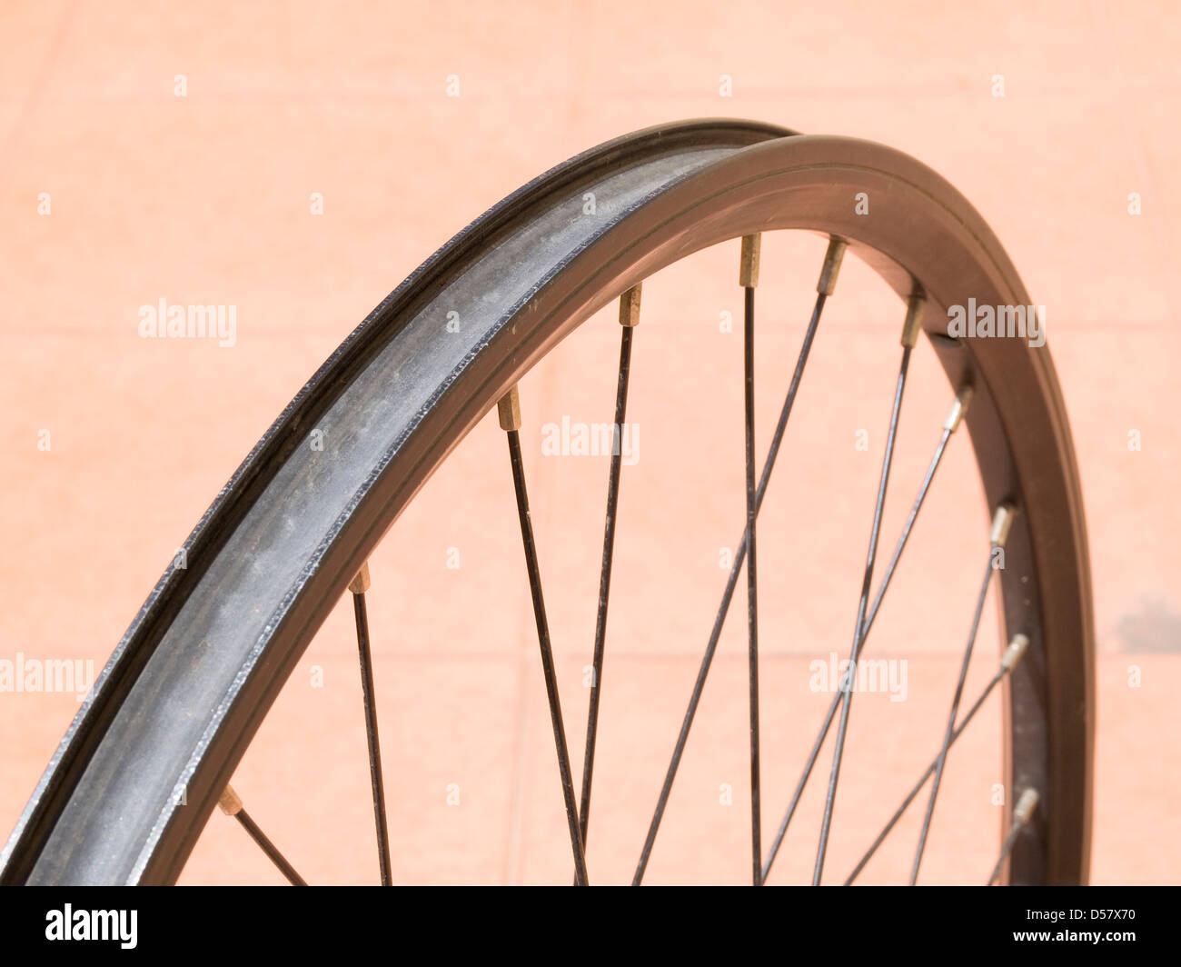 Metal rim bicycle wheel close up Stock Photo - Alamy