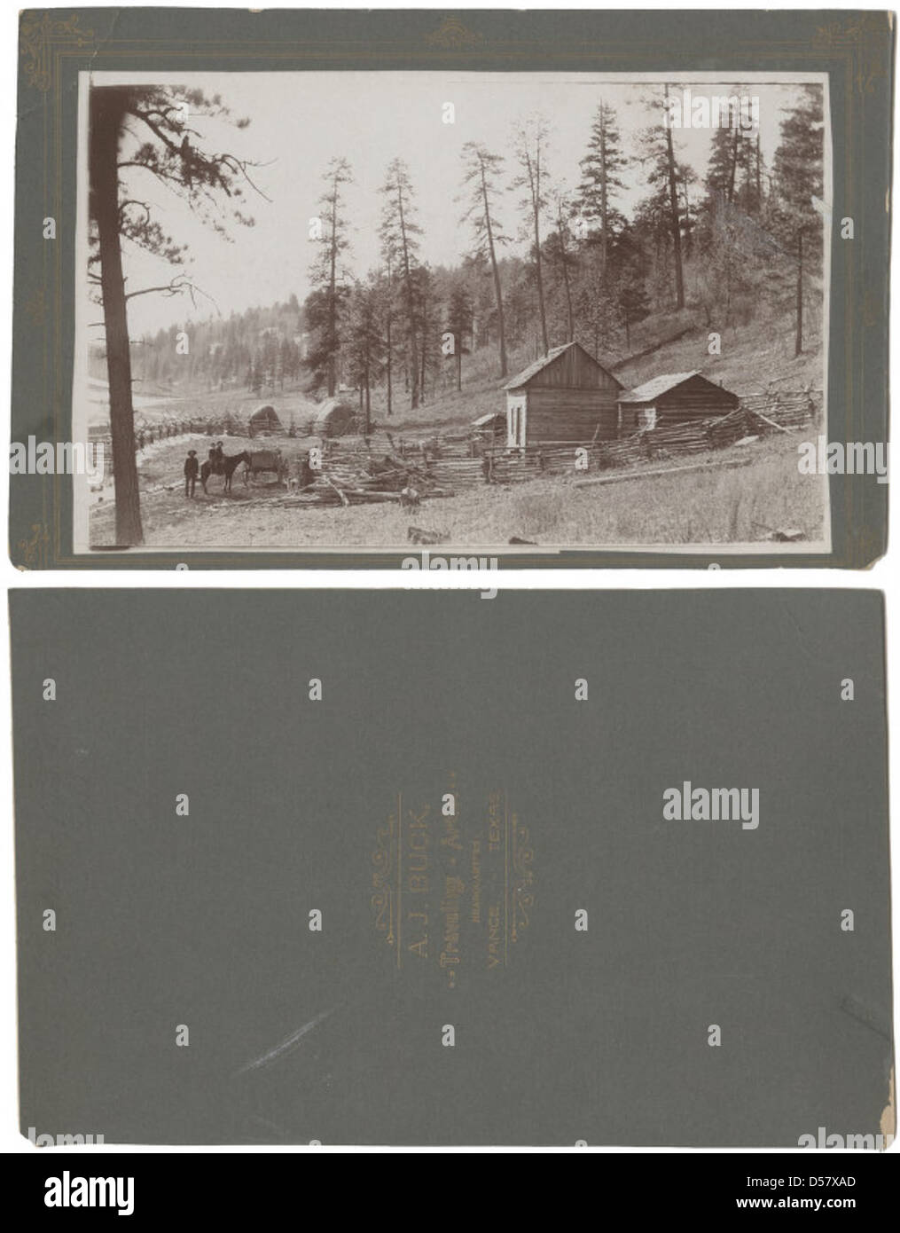 A photograph showing a U.S. West farm, featuring log buildings, trees ...