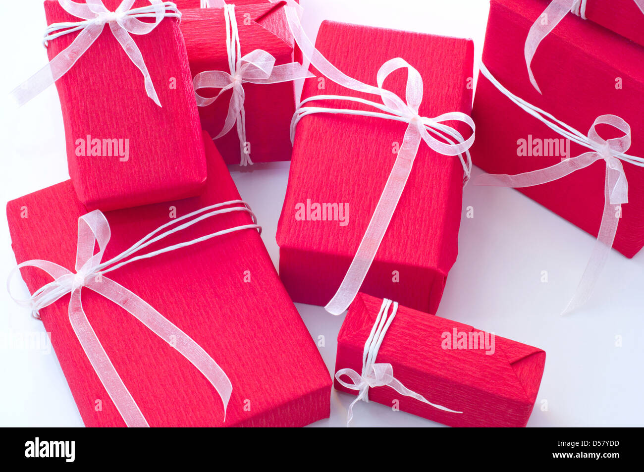 Present packets with bows Stock Photo - Alamy