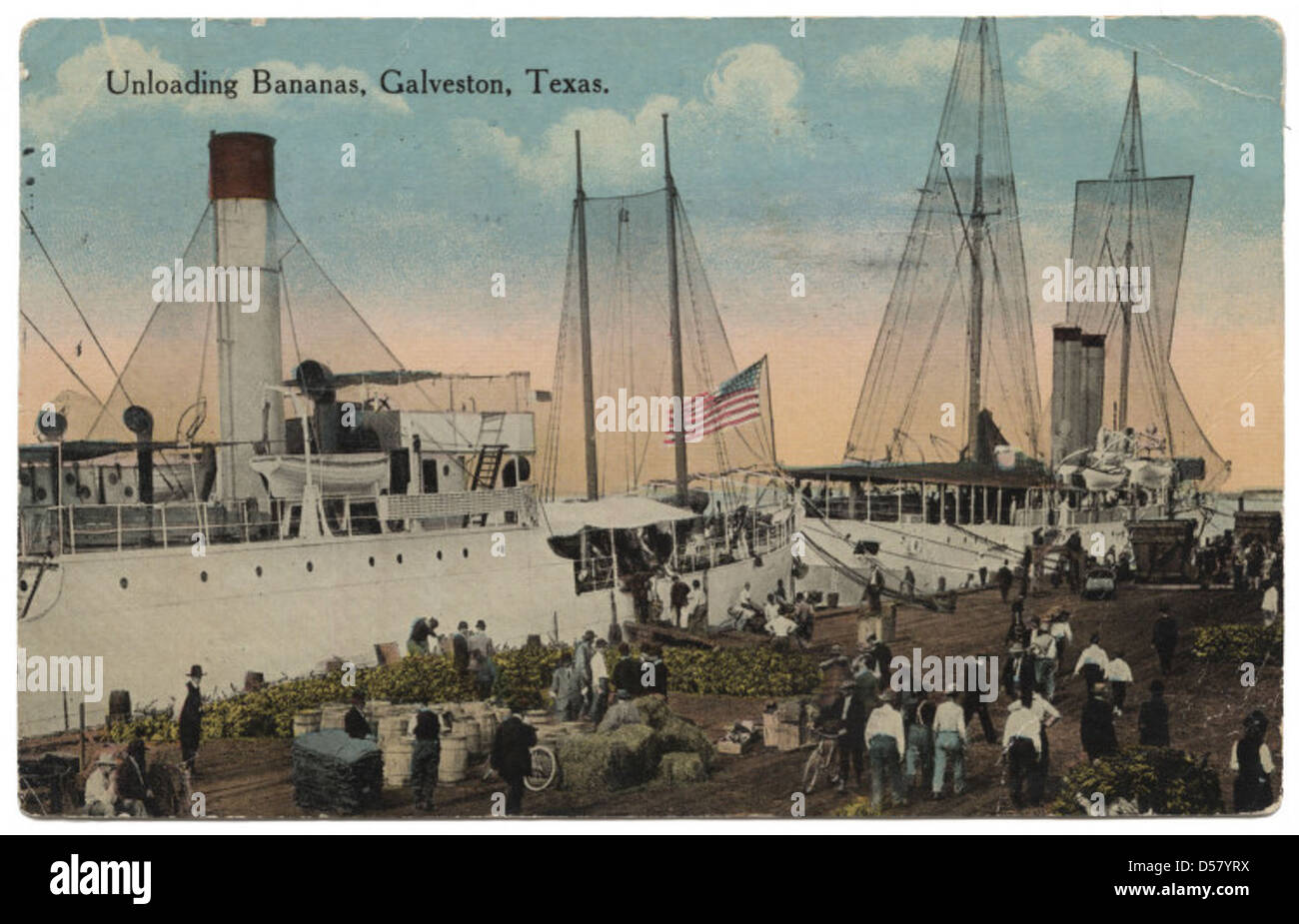 This photograph shows workers unloading bananas at the docks of ...