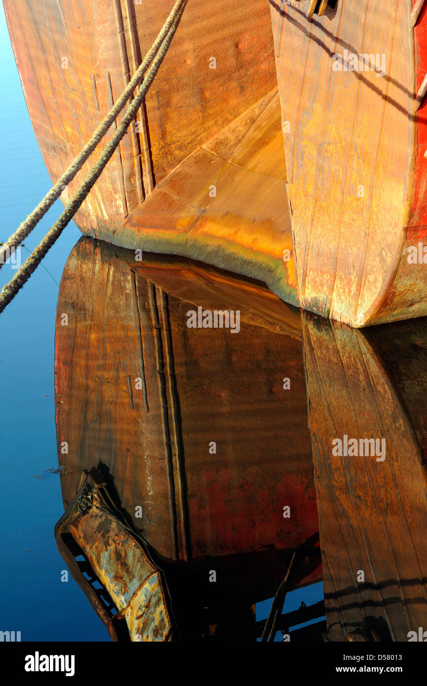 The stern of a rusty fishing boat, a stern trawler, with a stern ramp ...