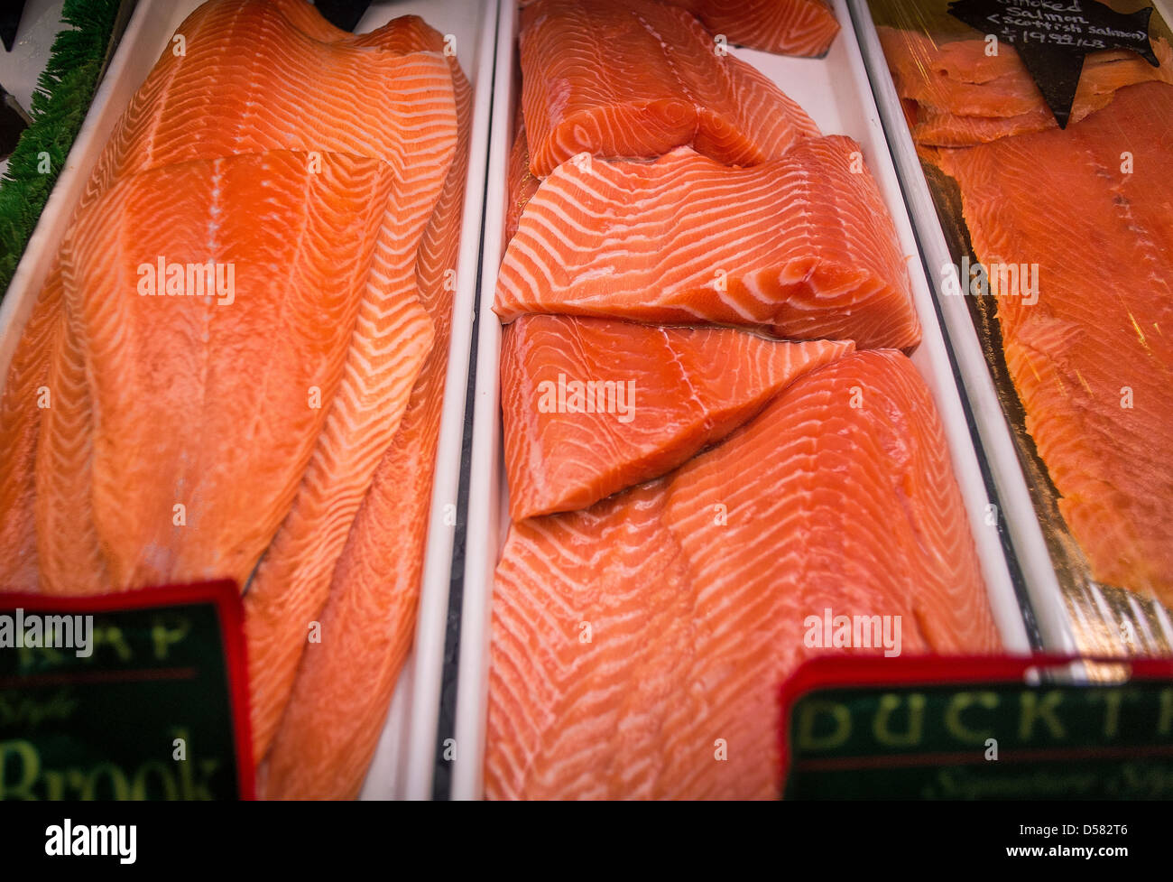 Salmon display at a seafood market Stock Photo - Alamy