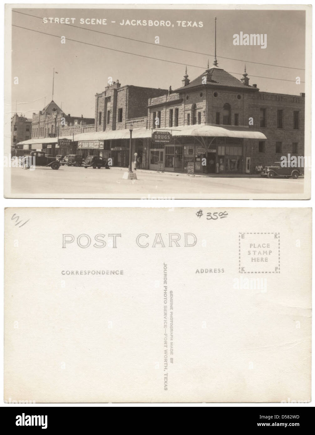 A street scene from Jacksboro, Texas, showing automobiles, shops, and ...