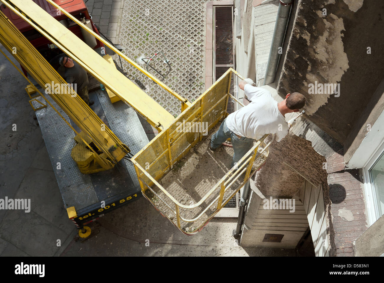 Poznan, Poland, broeckelnder plaster is struck by a facade Stock Photo ...