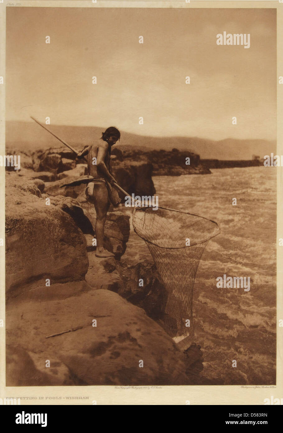 A 1909 photograph depicting a traditional fishing method known as dip ...