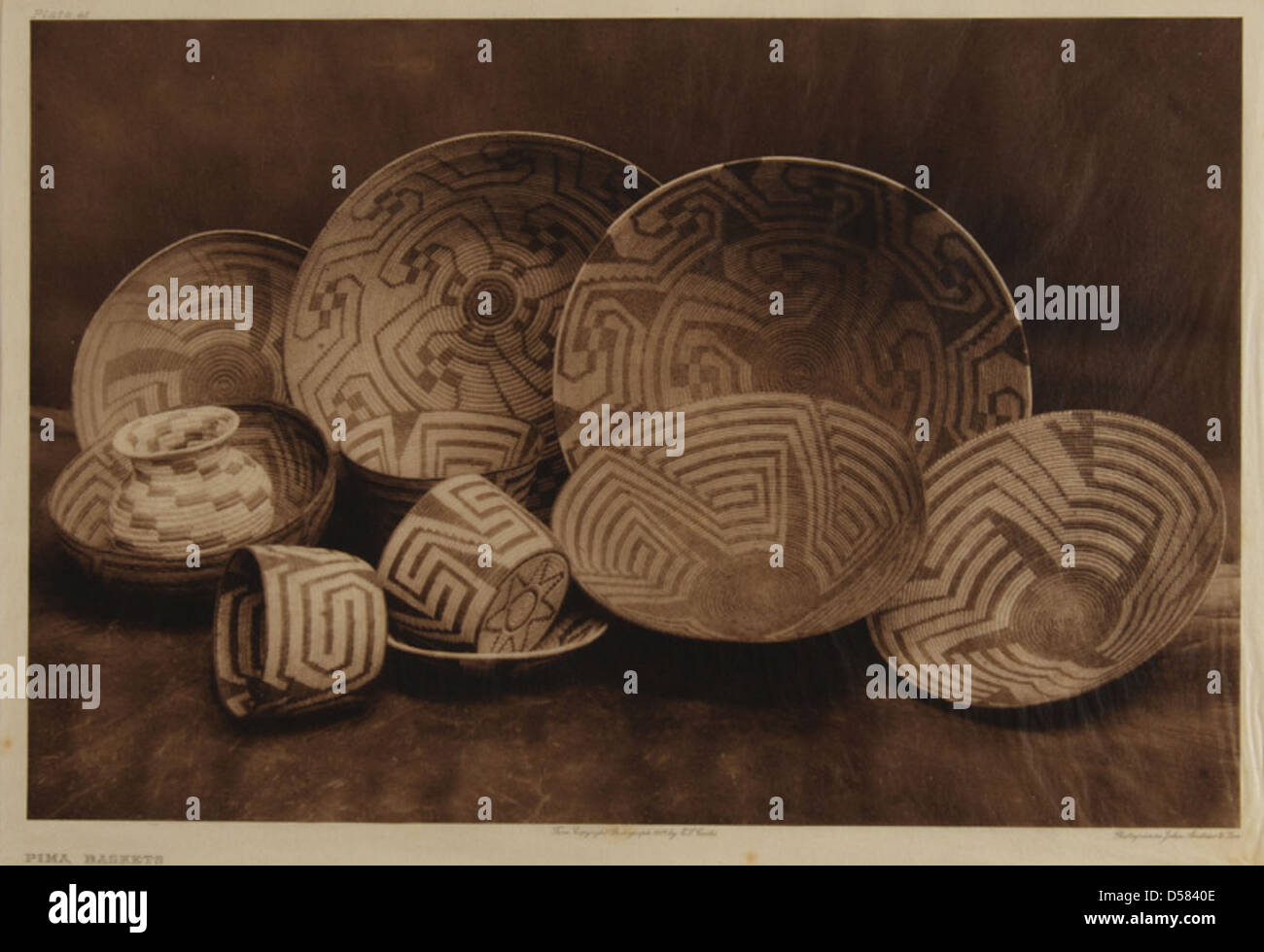 This 1907 image shows traditional Pima baskets, created by the Pima ...