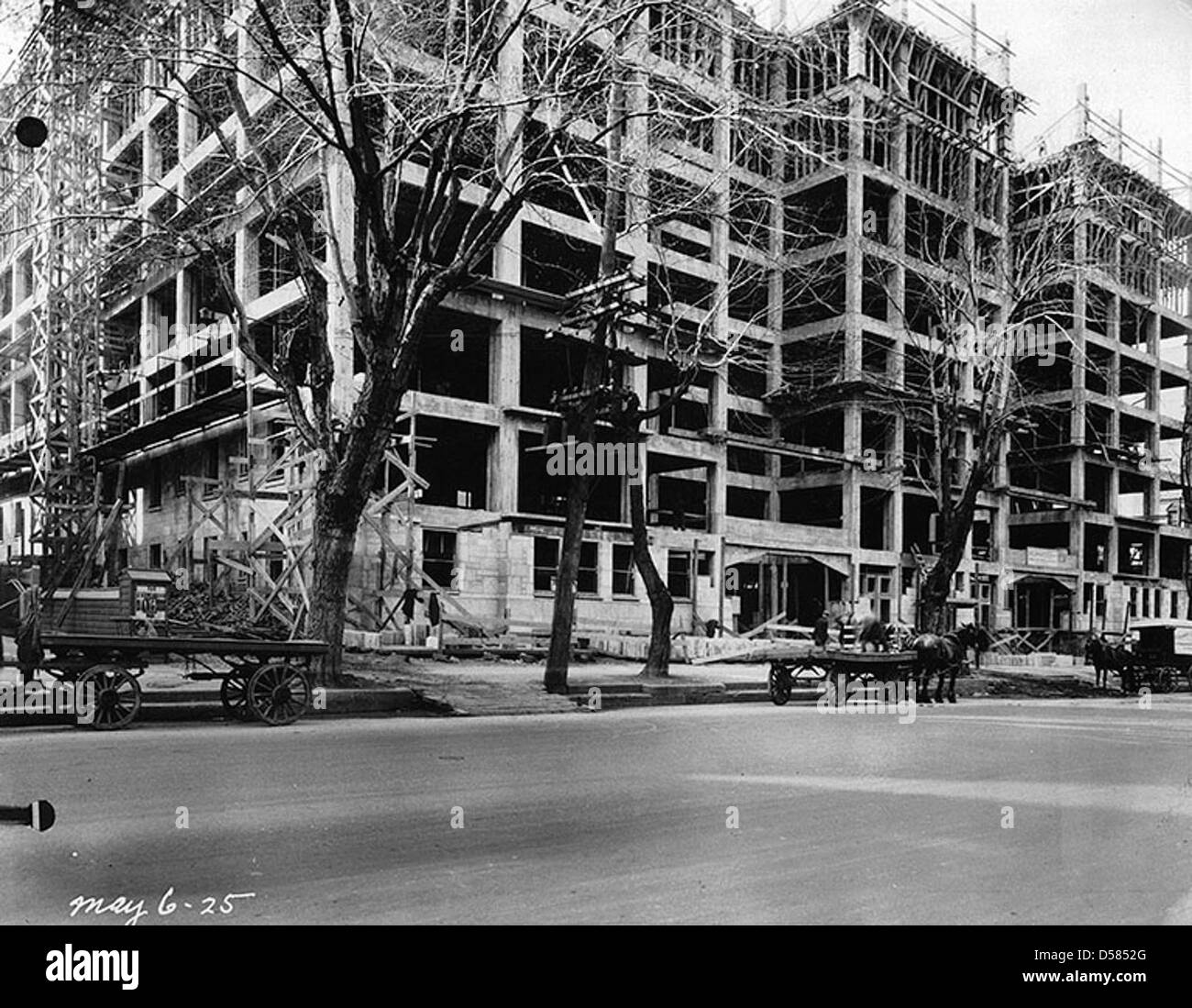 A photograph documenting the construction of the Chateau Apartments on ...