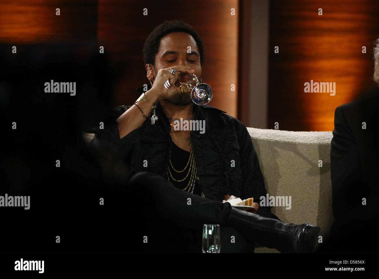 Lenny Kravitz drinking champagne on German ZDF TV show 'Wetten, dass ...