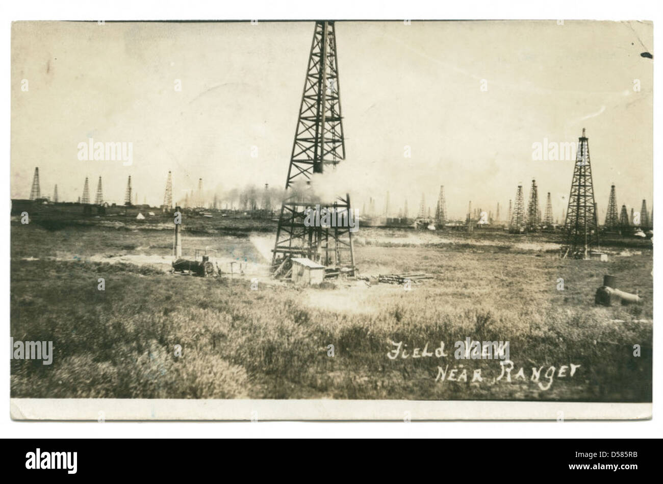 This image shows an expansive field view near Ranger, Texas, with oil ...