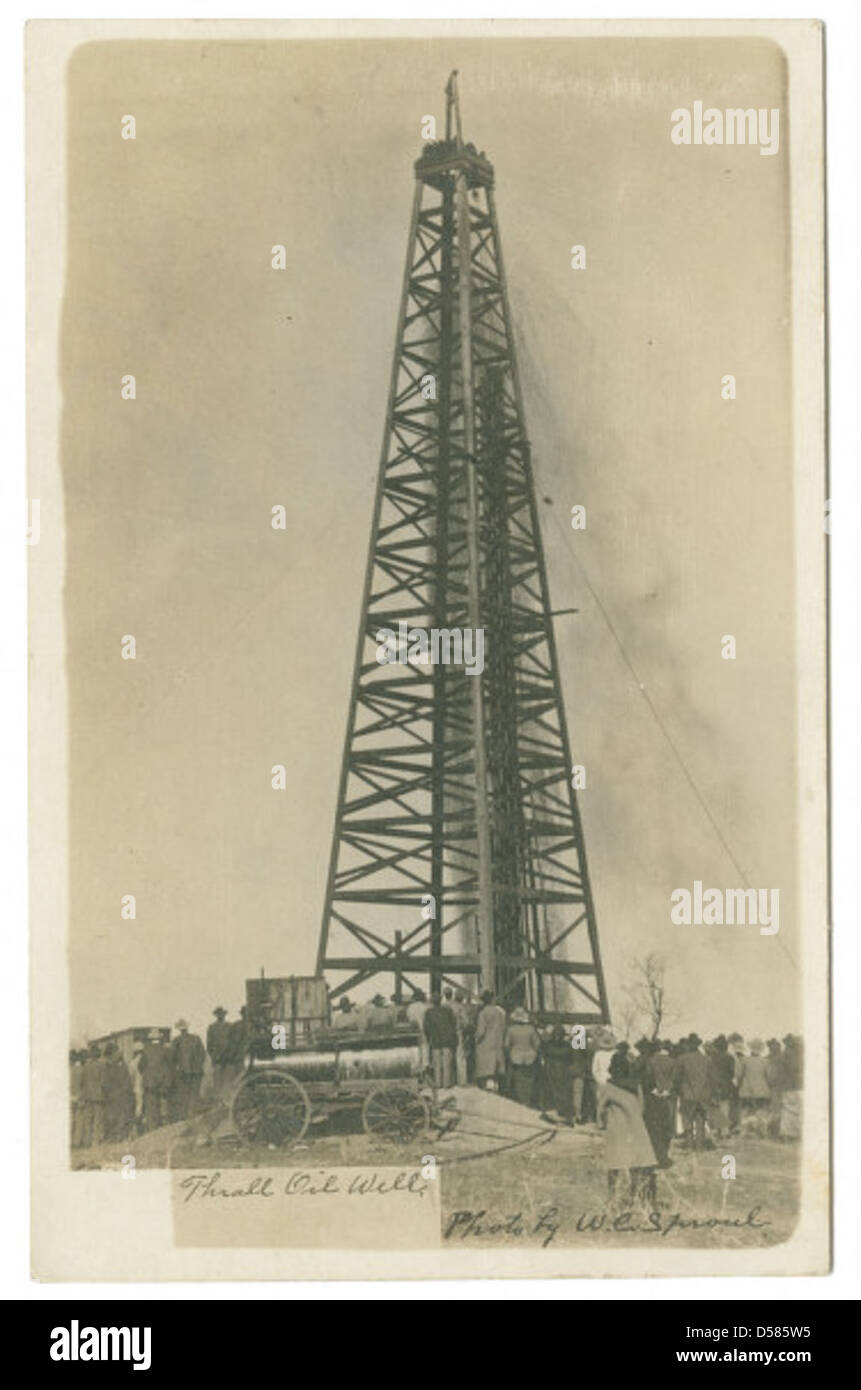 A vintage photograph of oil well derricks in Thrall, Texas. The image ...