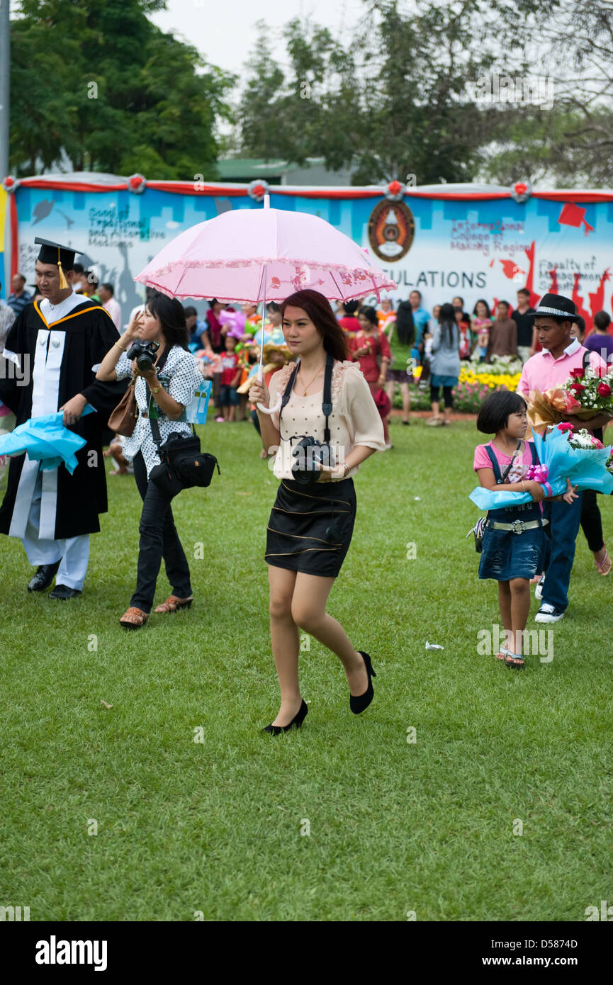 Chiang Rai, Thailand, a graduate of the Rajabhat University with pink ...