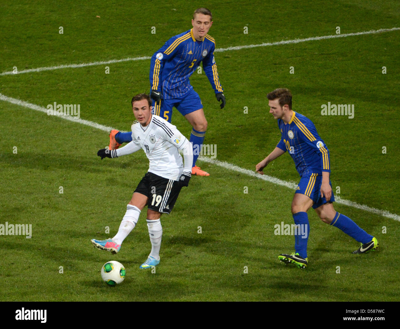 Germany's Mario Goetze (L) vies for the ball with Kazakhstan's ...