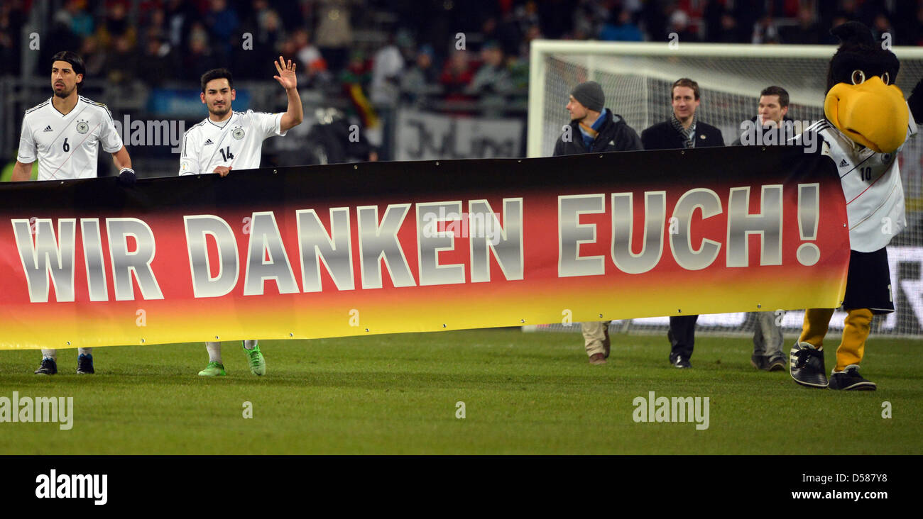 German team show a banner after the FIFA World Cup 2014 qualification ...