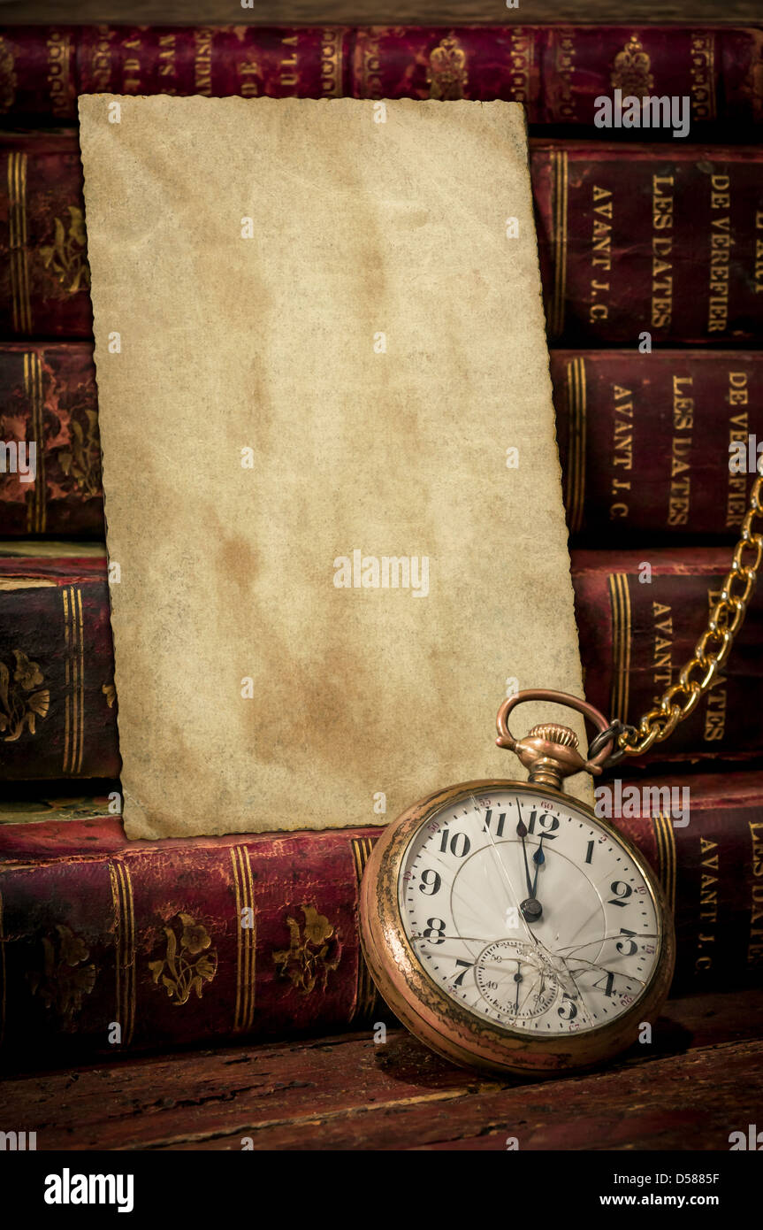 Old photo paper texture, pocket watch and books in Low-key Stock Photo ...
