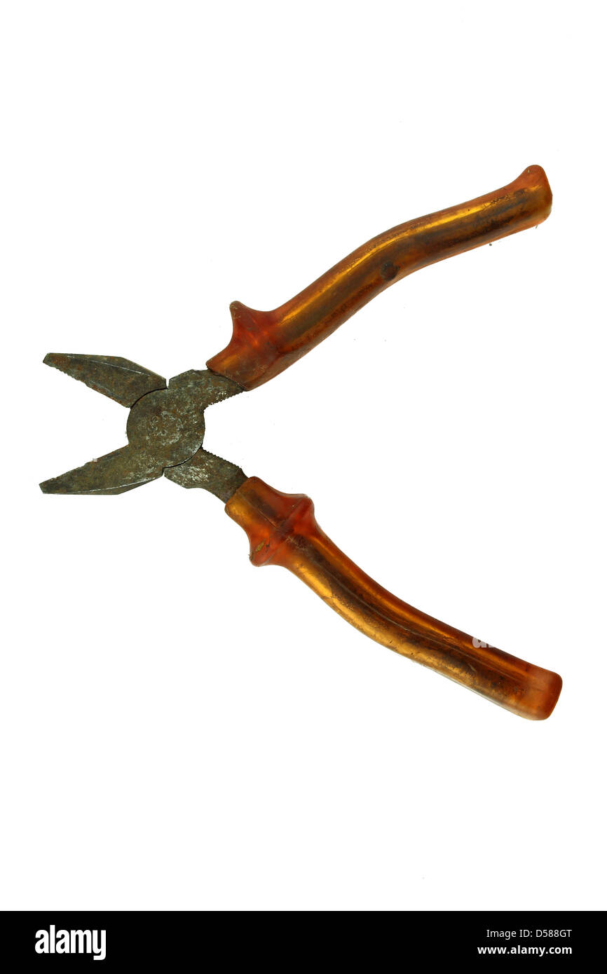 used old Metal pliers with red grips isolated on white background with ...