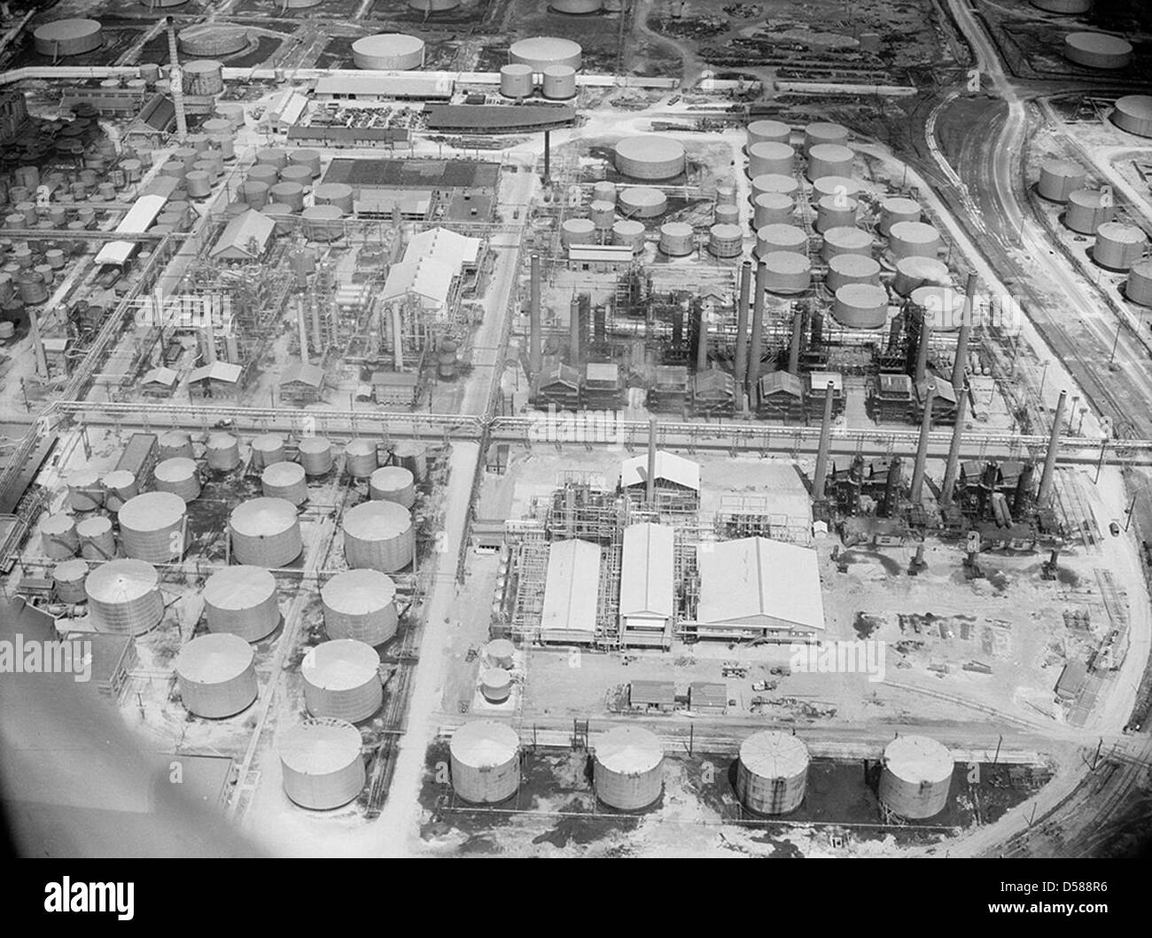 An aerial photograph of the Magnolia Petroleum Company refinery and ...