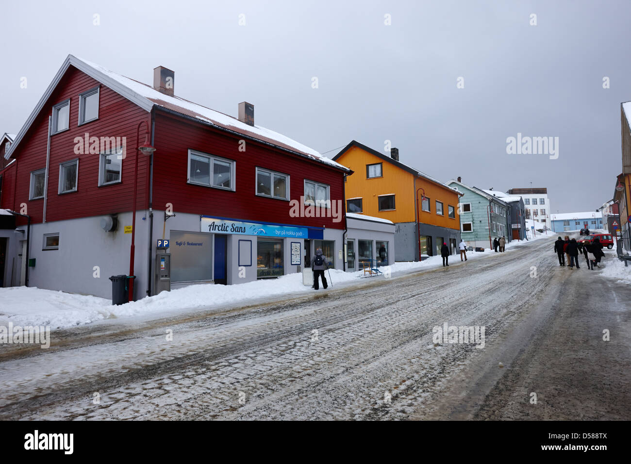 traditional shops on steep main shopping street storgata Honningsvag ...