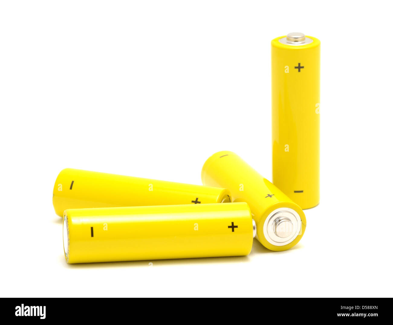 Yellow AA size batteries placed on a white background Stock Photo - Alamy