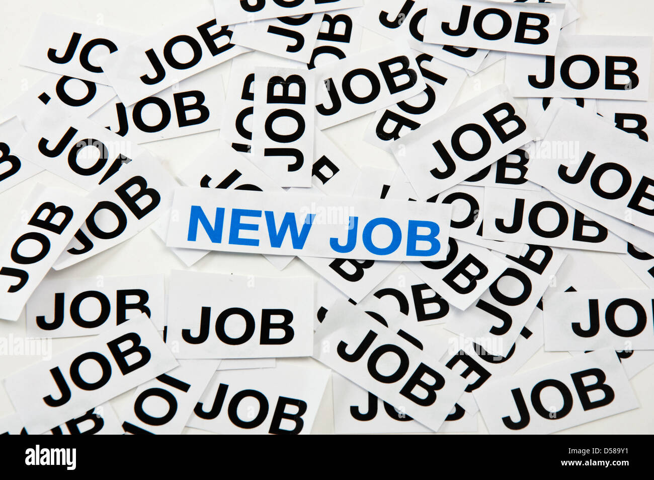 Printed paper notes with the word "Job" in black ink, and above them ...