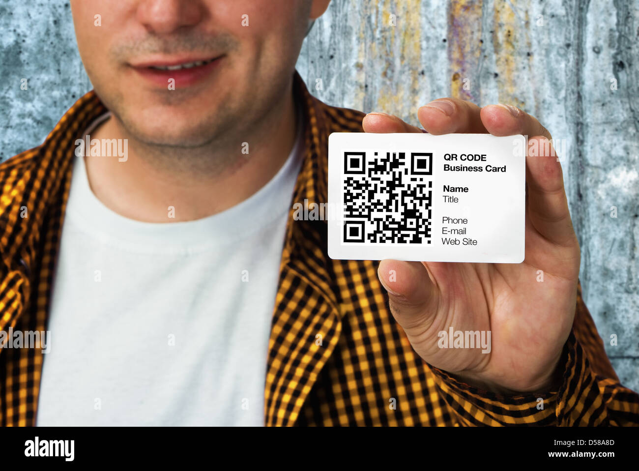 Construction worker holding a QR code business card, business ...