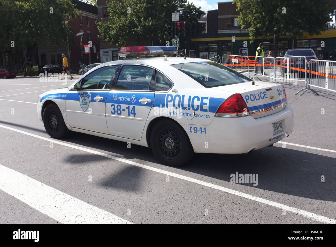 The side of a police cruiser car parked in downtown Montreal, Quebec ...