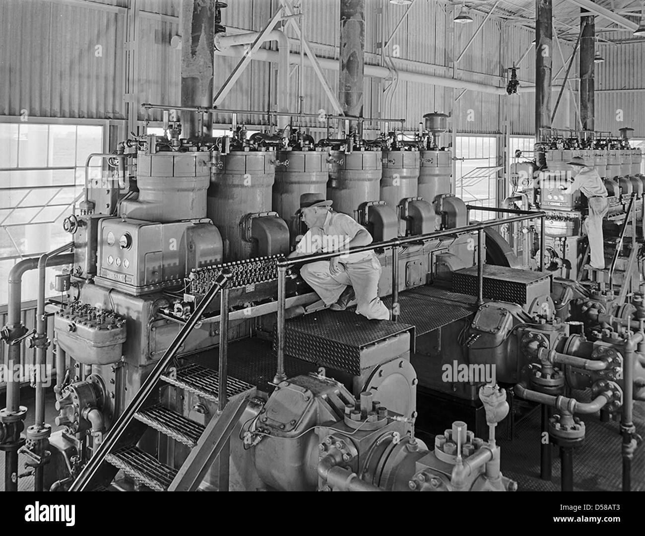 A photograph showing employees of Hudson Engineering Corp. in Houston ...