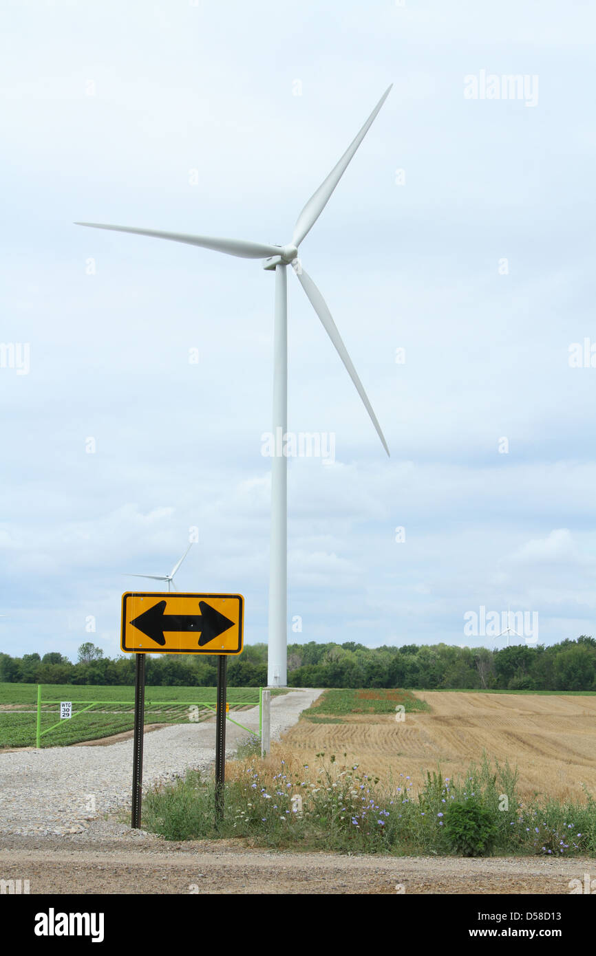 Windmill Choice. Left Right Road Sign in front of Windmill Stock Photo ...
