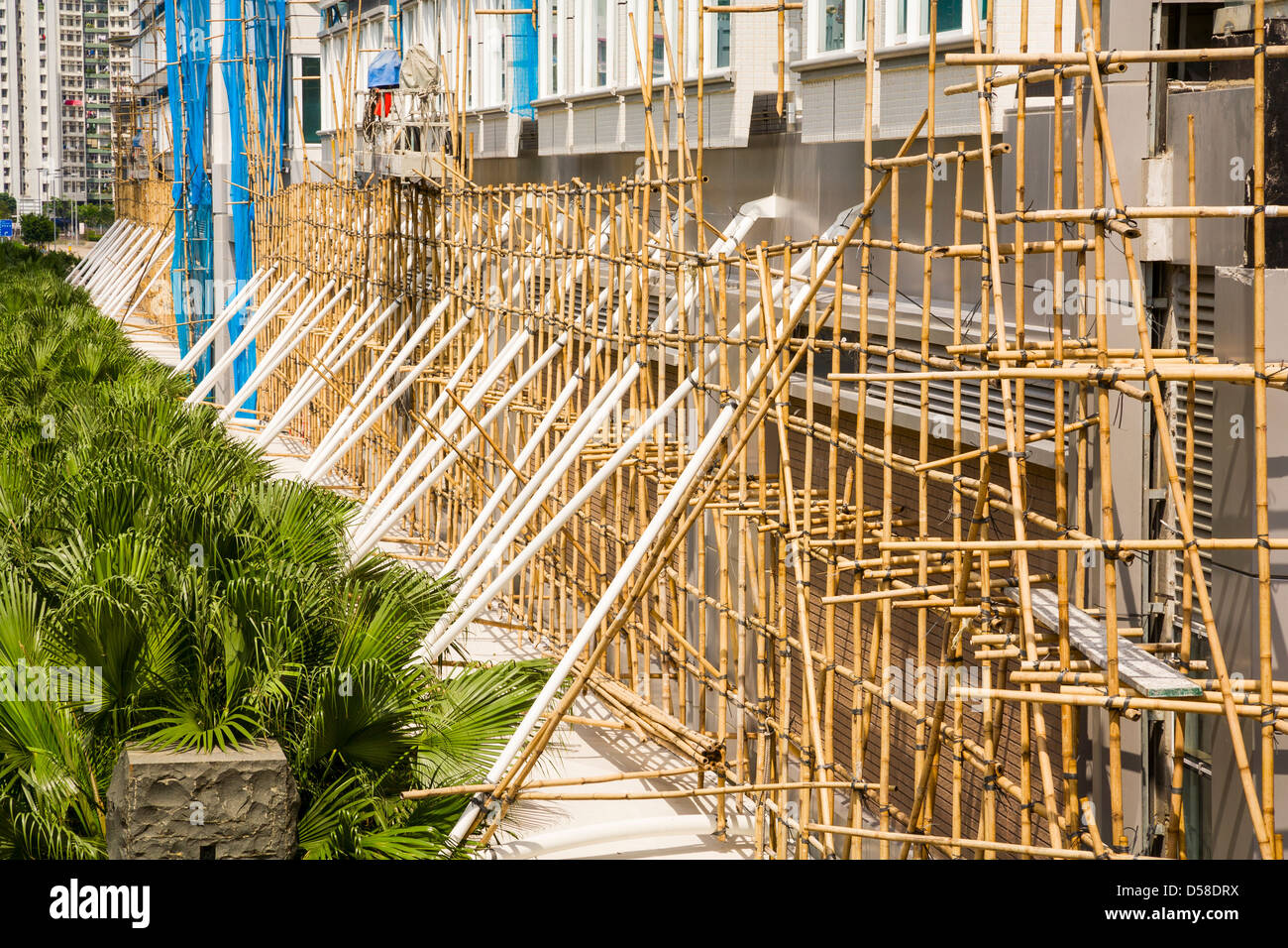 Construction site in Hong Kong with bamboo scaffolding Stock Photo - Alamy