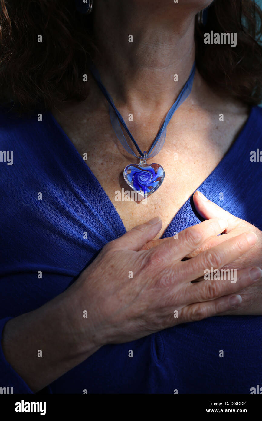 Woman hand over heart gratitude hi-res stock photography and images - Alamy