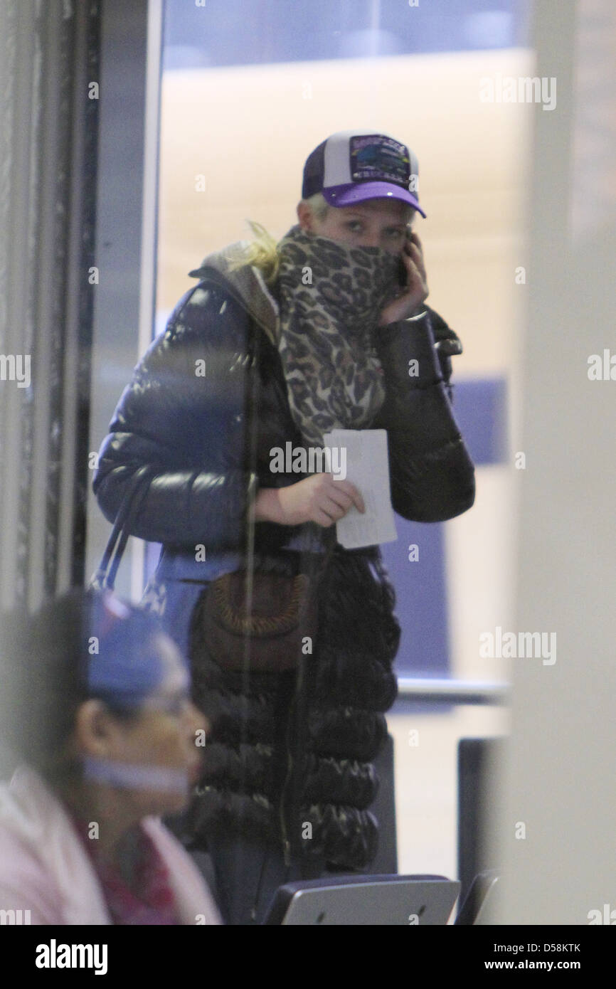 Former Germany's Next Topmodel contestant Sarah Knappik catching a ...