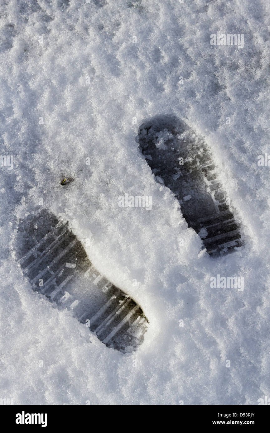 close up of footprints in snow Stock Photo - Alamy